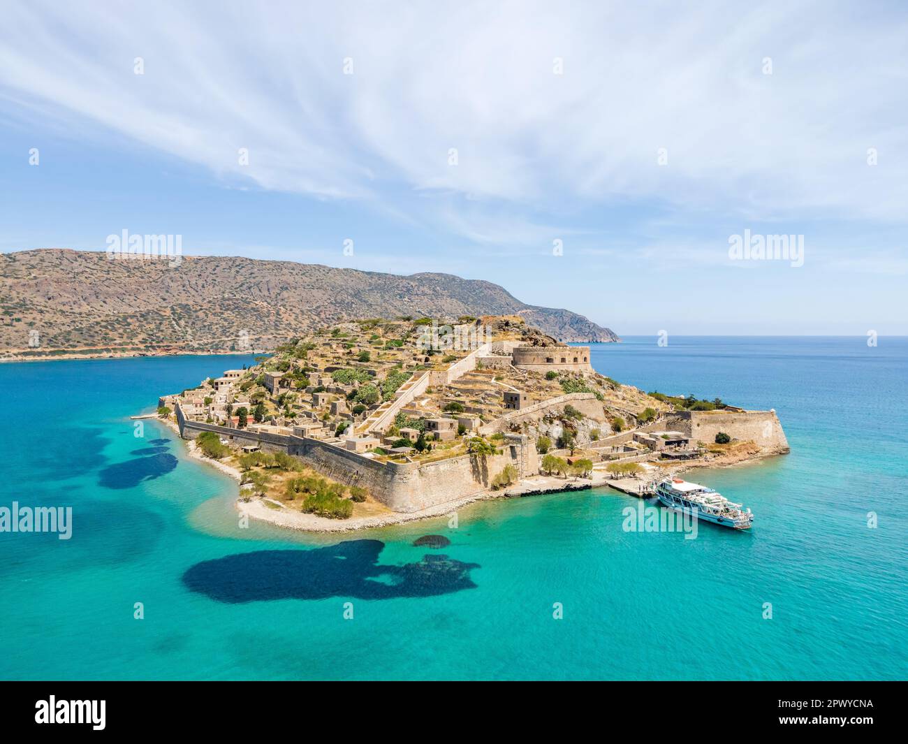 Aerial drone view of Spinalonga island with calm sea. Old venetian ...