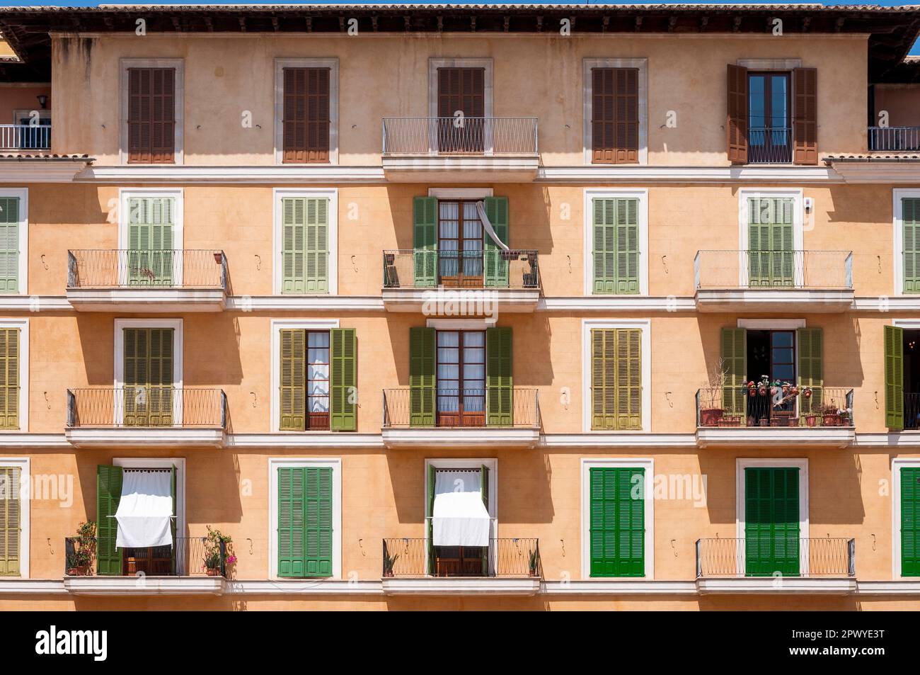 The facade of a residential building in Mallorca, Spain with balconies ...