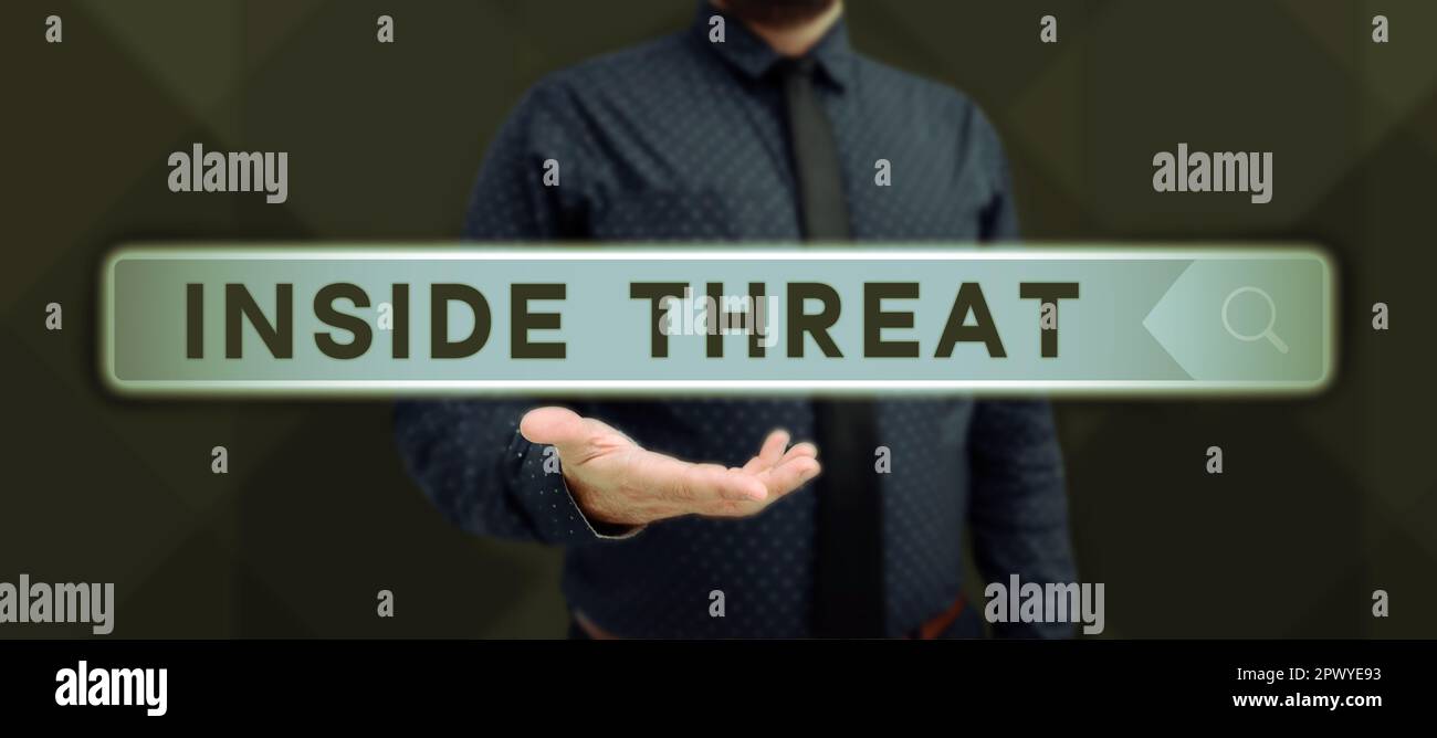 Hand writing sign Inside Threat, Word Written on Information that only ...