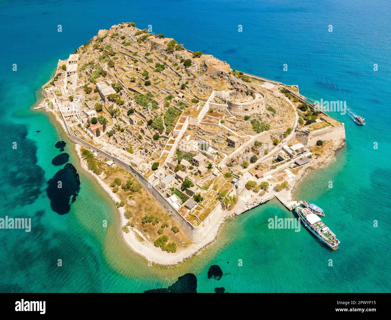 Top view of Spinalonga island with calm sea. Here were lepers humans ...