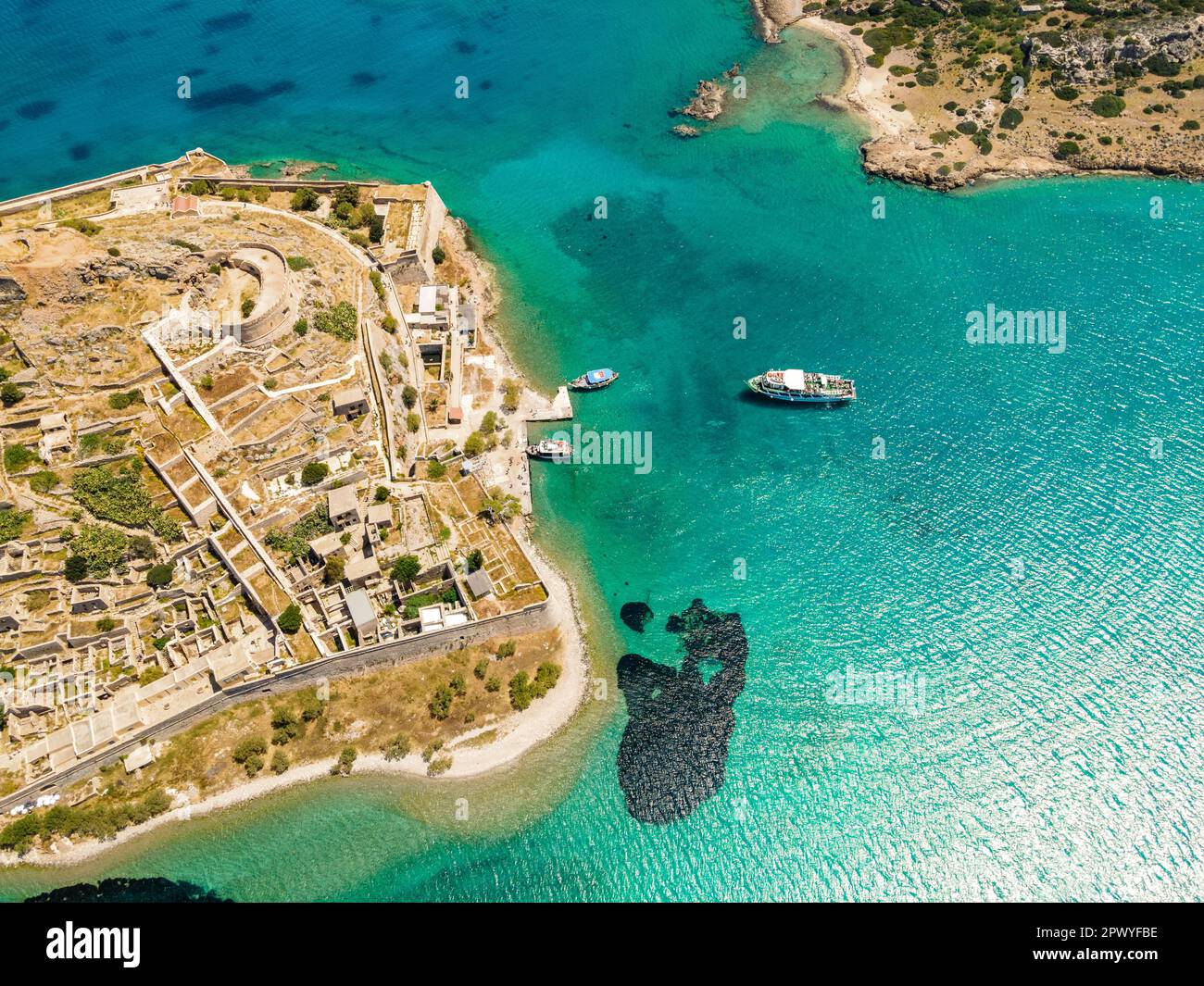Top view of Spinalonga island with calm sea. Here were lepers humans ...