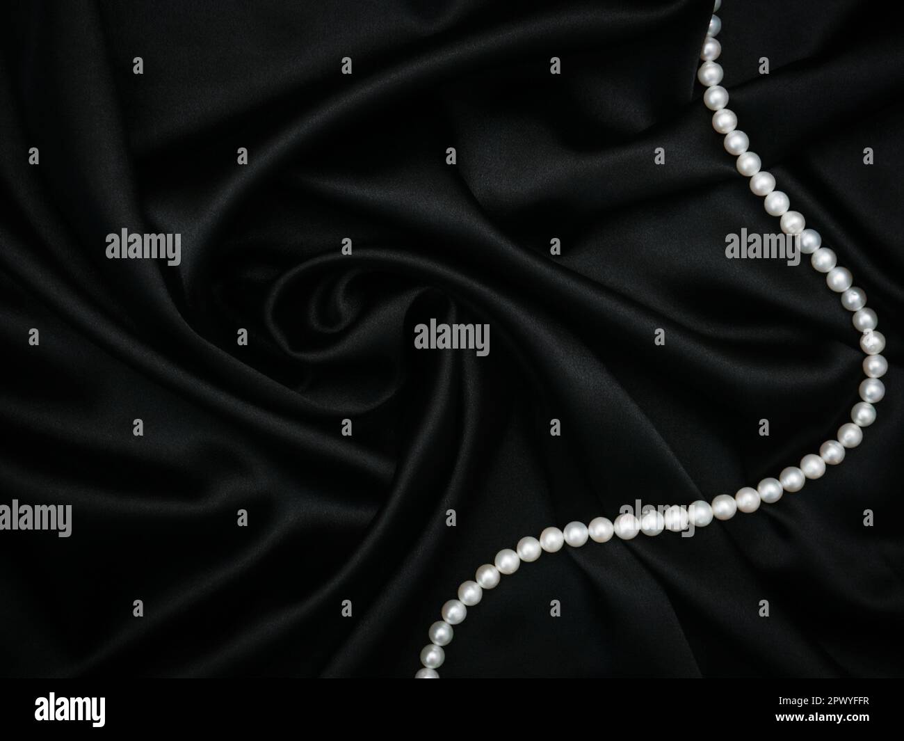 Beautiful set of women's evening accessories. Pearl neck and silk black ...