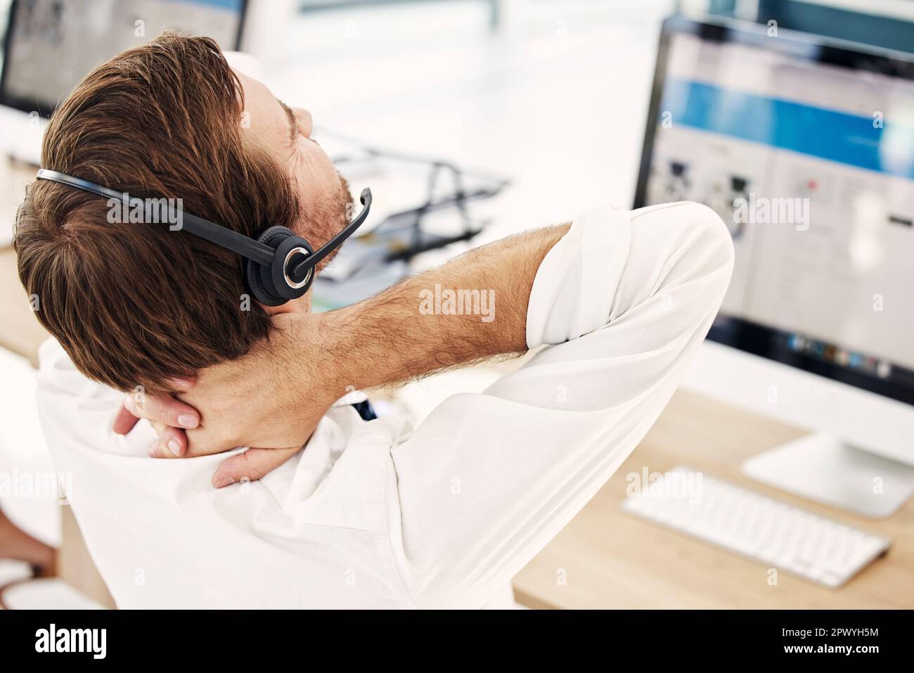 Neck pain, call center and man in office with stress, burnout and ...