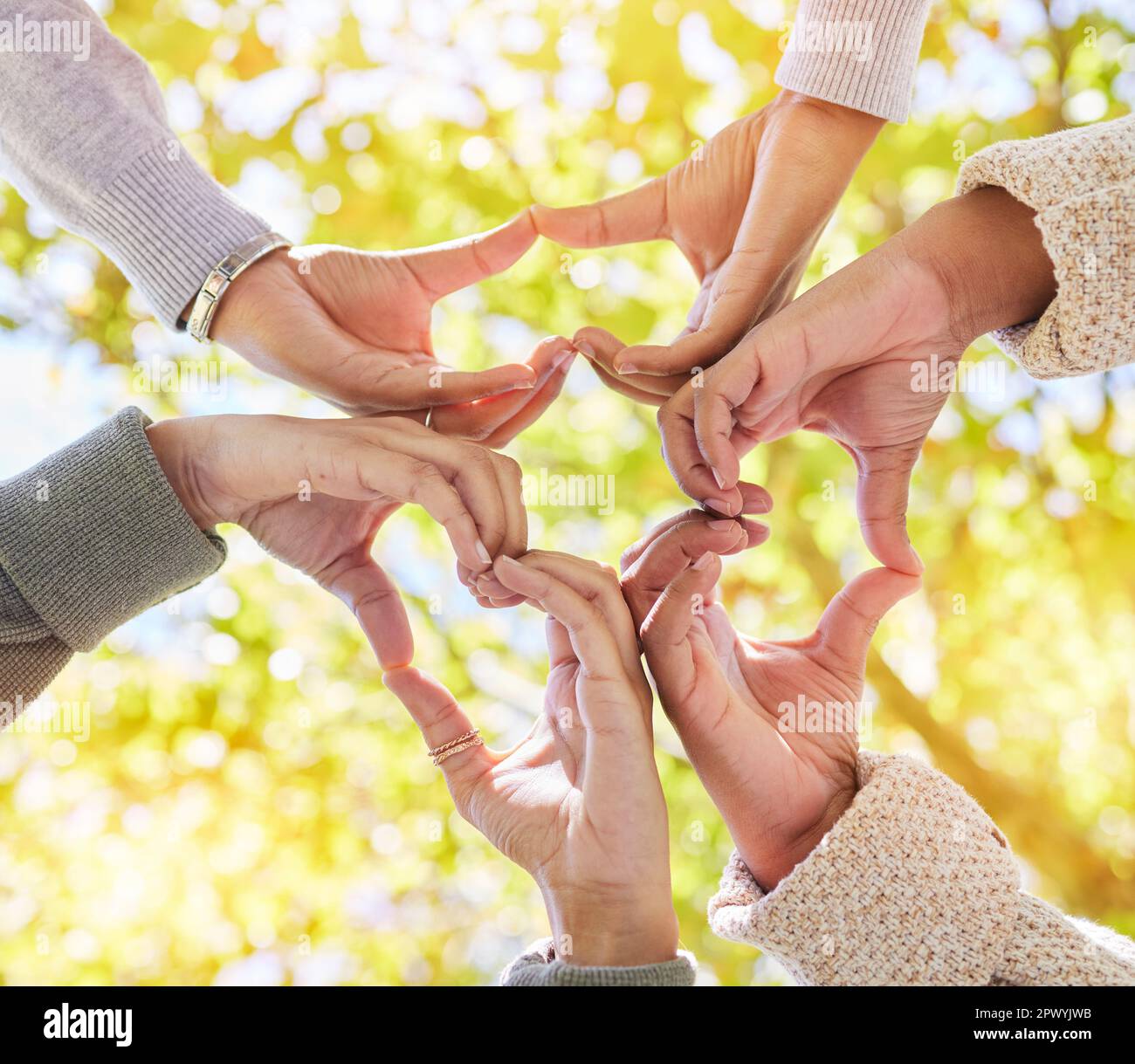 Heart tree hands outside hi-res stock photography and images - Alamy