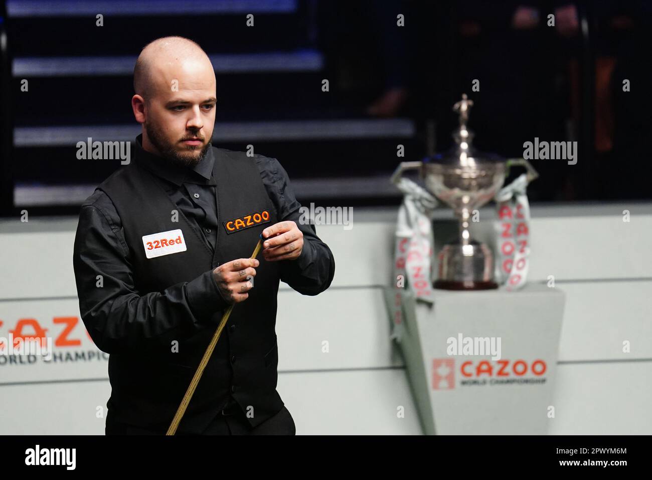 Luca Brecel in action against Mark Selby (not pictured) during the ...