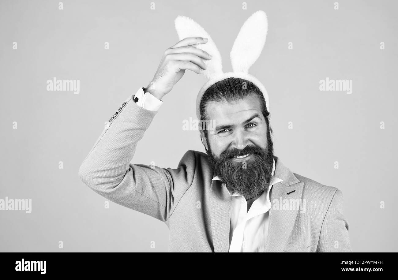 Man in rabbit ears. Preparation for Easter. concept of egg hunt. Easter ...
