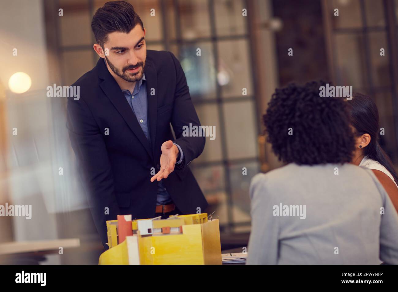 Lets discus how we can improve this model. young businesspeople having ...