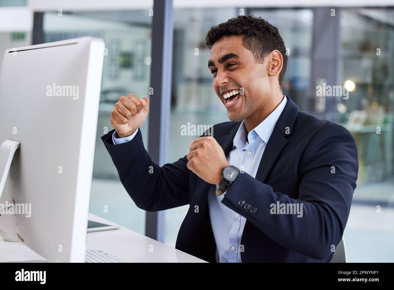 Businessman, computer or success fist in finance office for stock ...