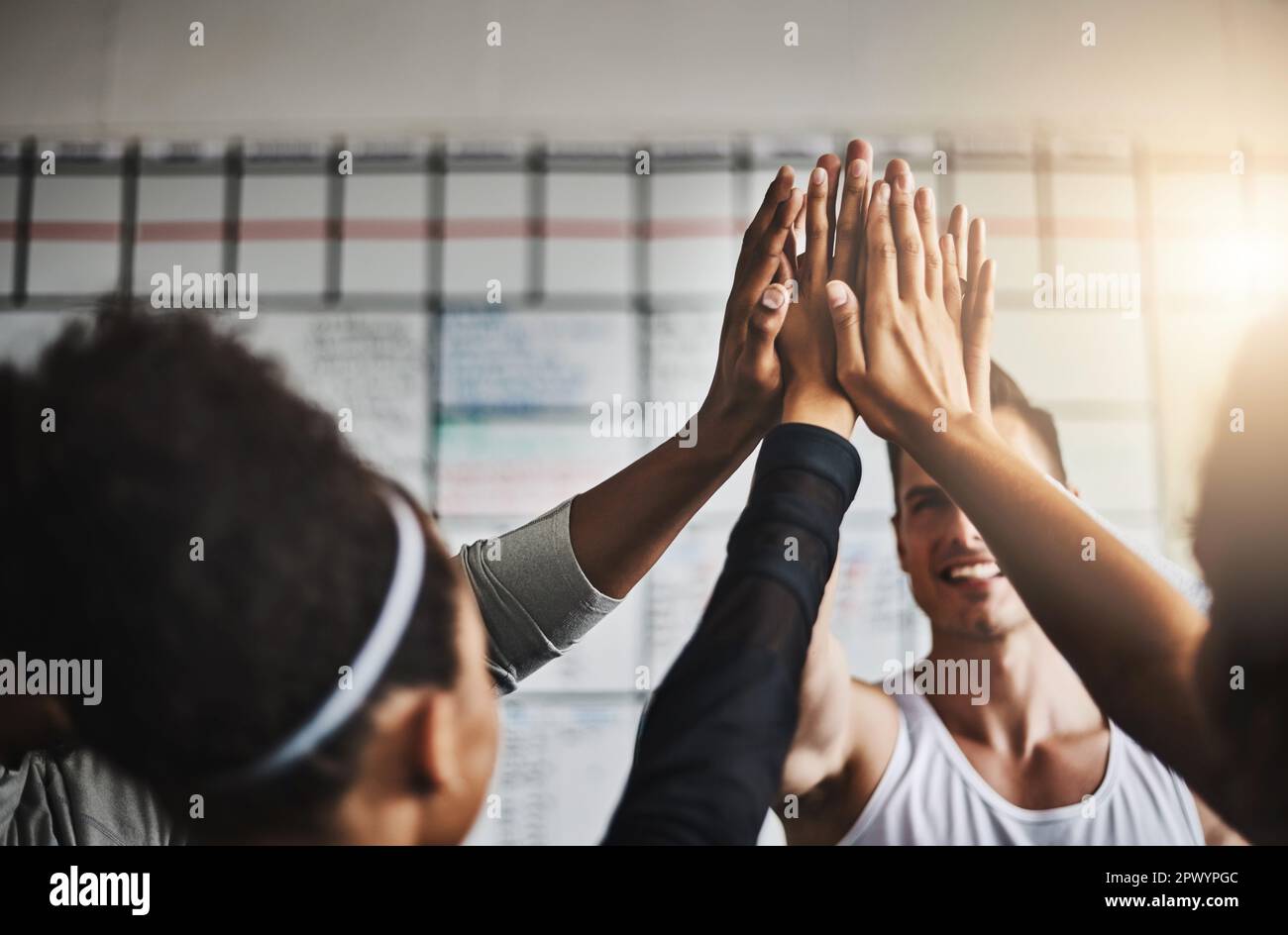 Fitness and friendship goals achieved. a group of young people giving ...