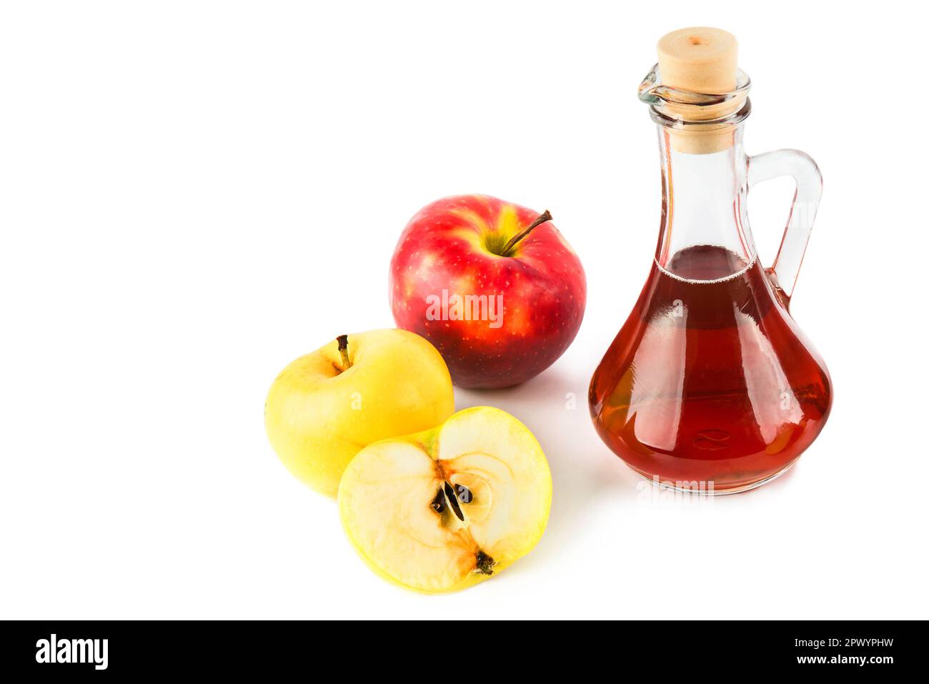 Apples and apple cider vinegar isolated on white background. Free space ...