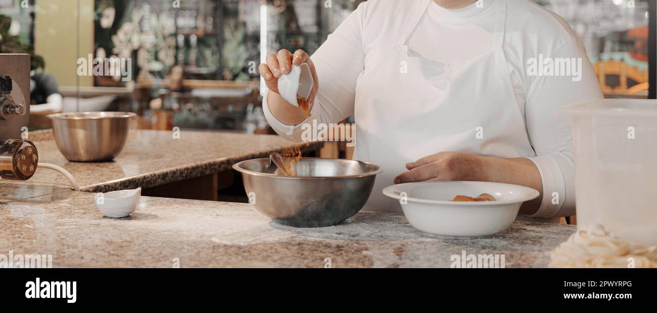 Crop woman adding flour hi-res stock photography and images - Alamy