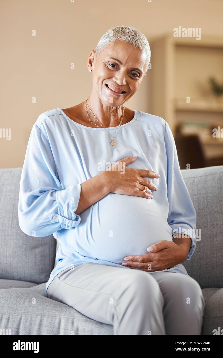 Mature woman hands on stomach hi-res stock photography and images - Alamy
