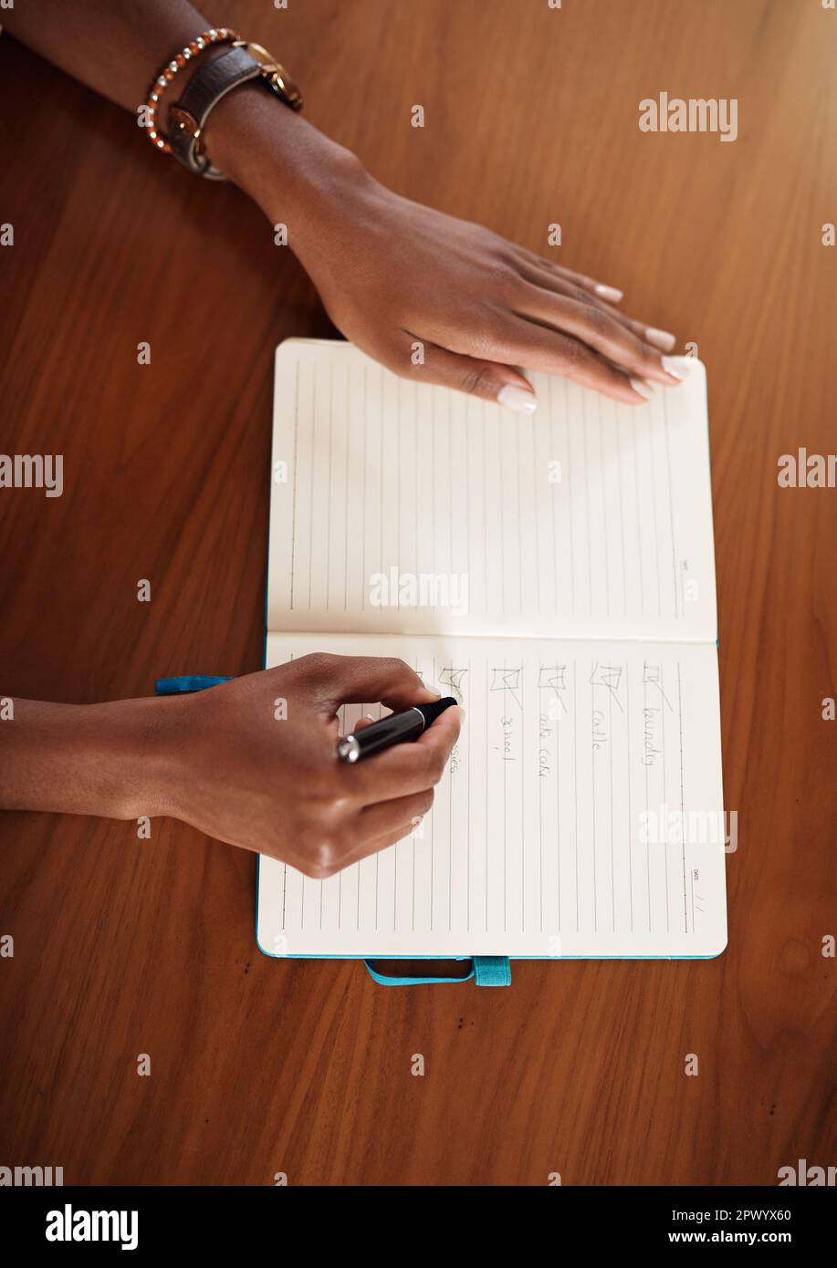 Ill take a break after this. a woman checking off tasks on a chore list ...