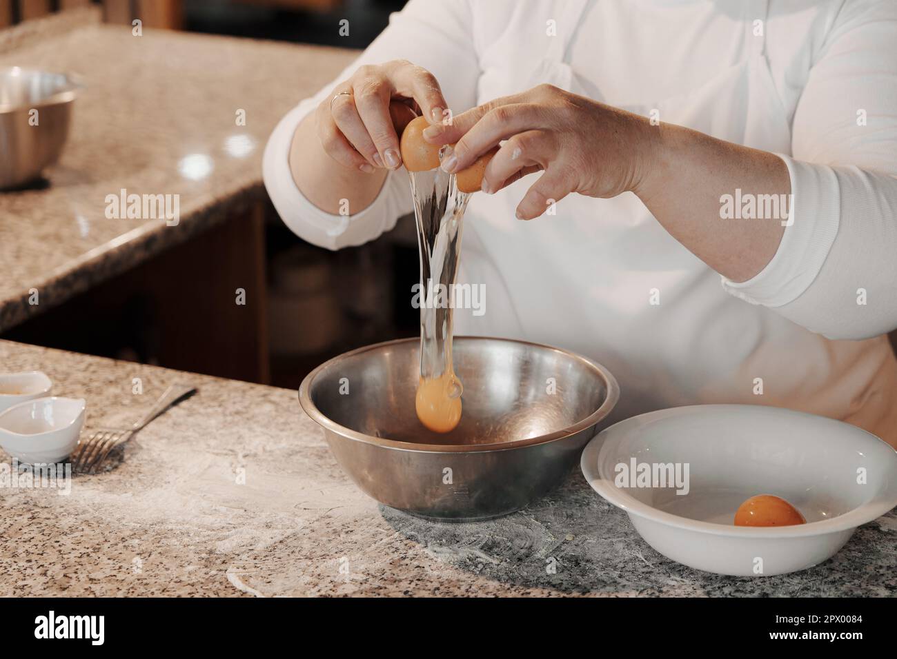 Egg cracking process hi-res stock photography and images - Alamy