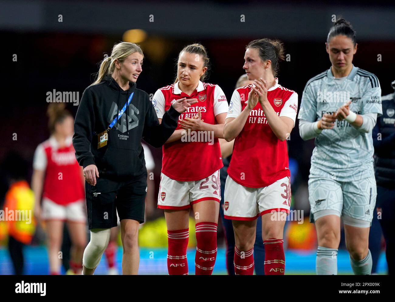 Arsenal's Leah Williamson (left) speaks to Teyah Goldie and Lotte ...