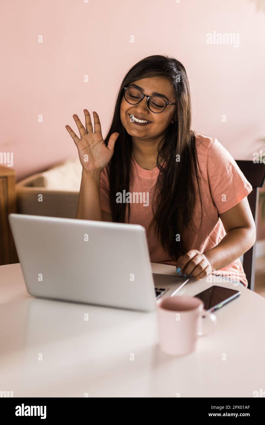 Portrait indian woman freelancer or entrepreneur have video conference ...
