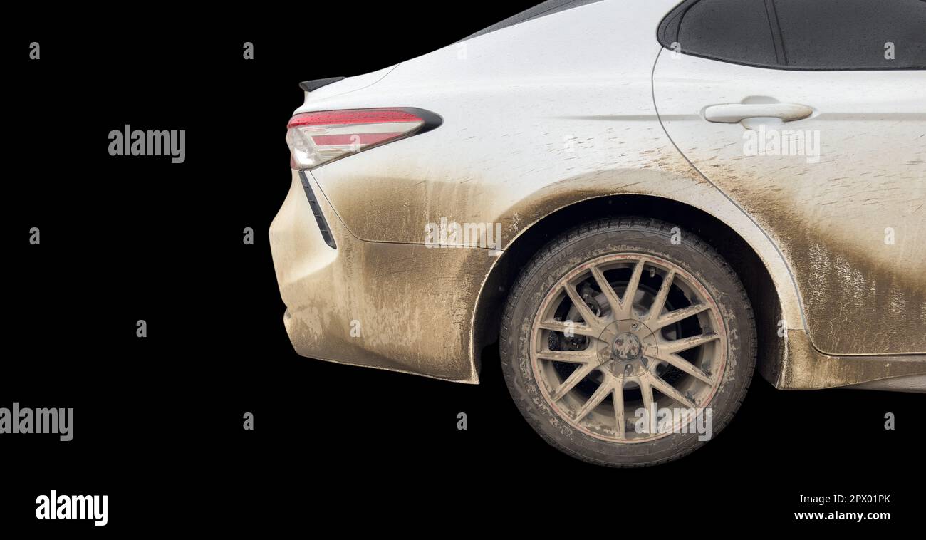 Side view of a very dirty car. Fragment of a dirty car. Dirty ...