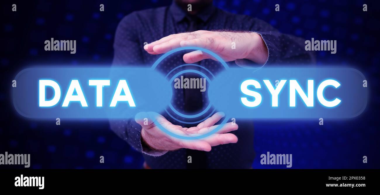 Hand writing sign Data Sync, Conceptual photo data that is continuously generated by different ...