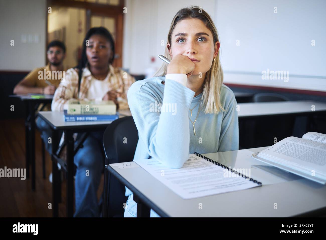 University woman, education class and lecture listening with a student ...