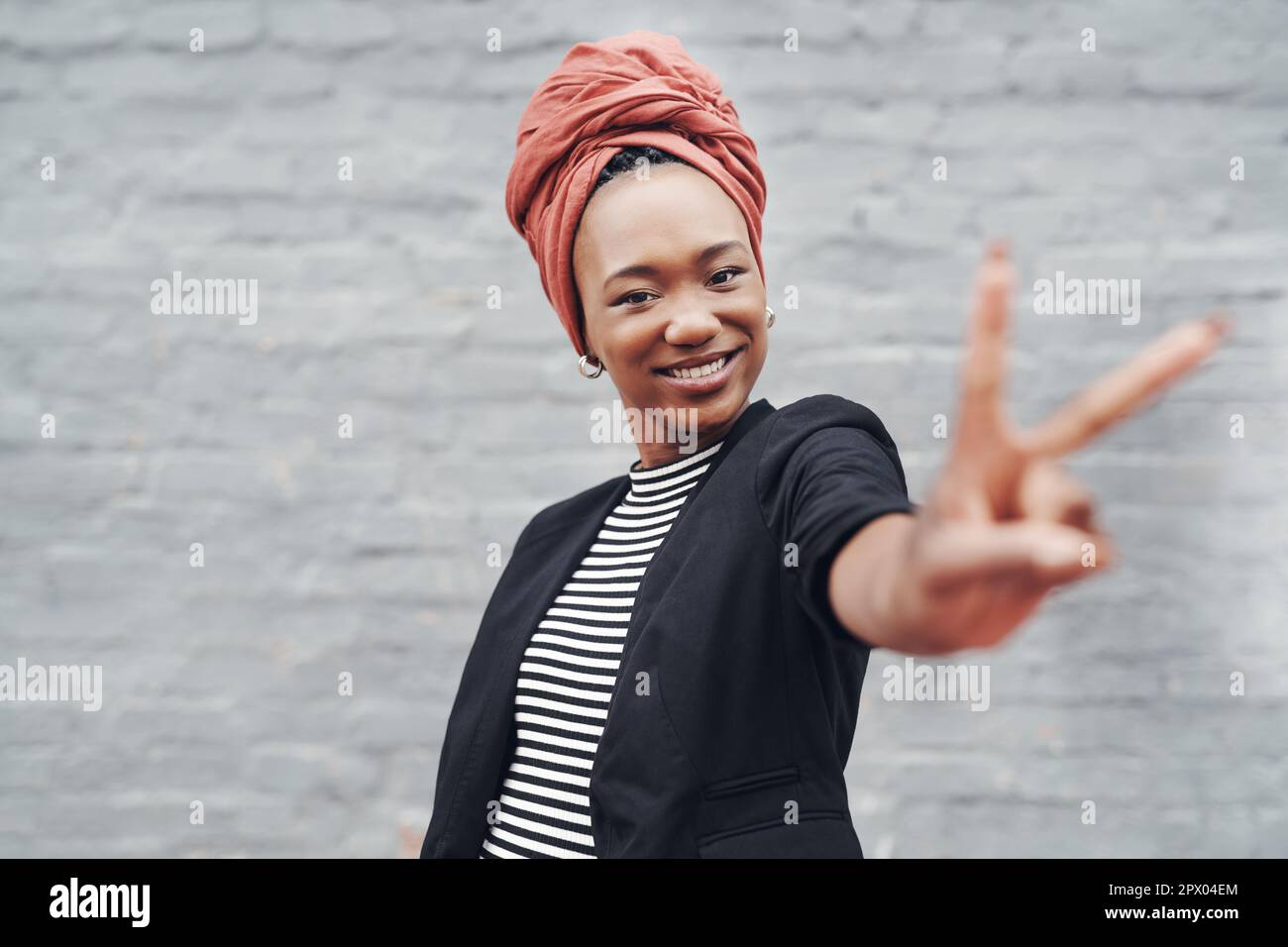Peace to all. Cropped portrait of an attractive young businesswoman ...