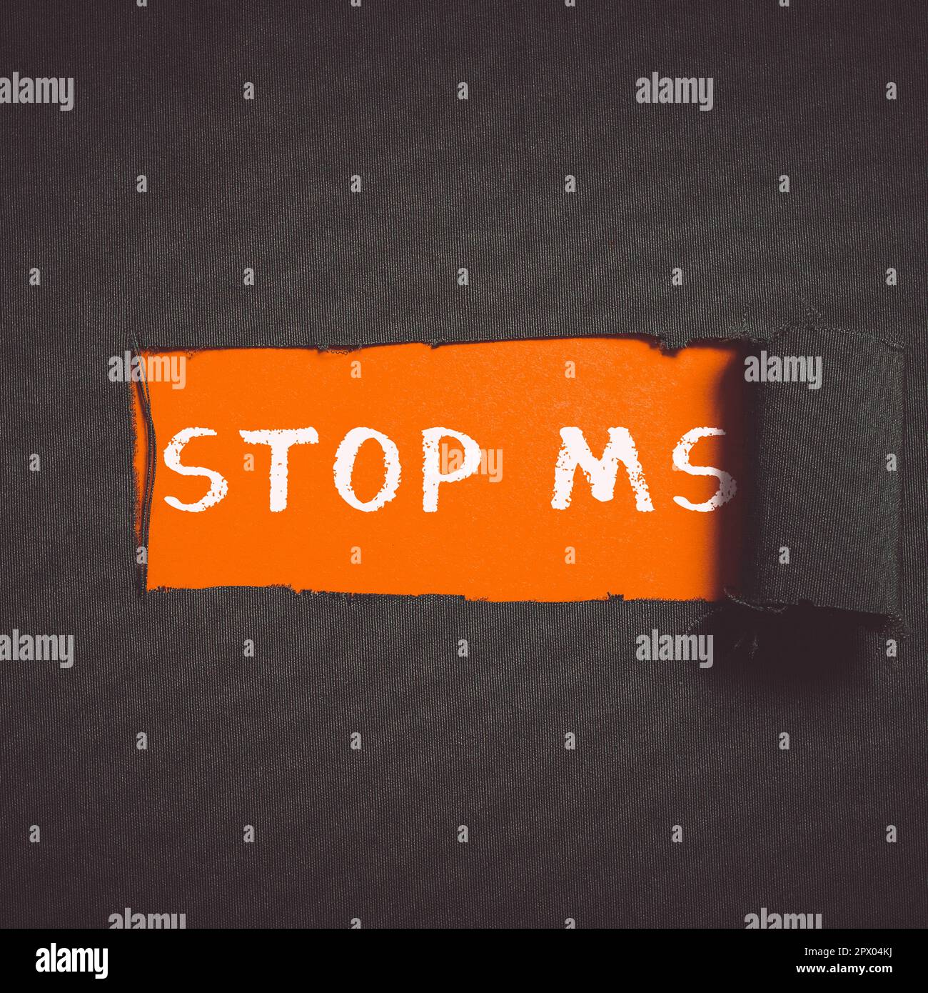 Hand writing sign Stop Ms, Word for prevent disease marked by patches ...