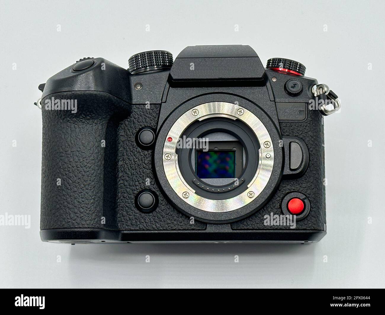 Black professional mirrorless camera on a white background Stock Photo ...