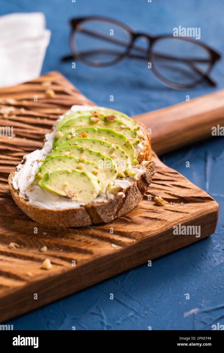 Avocado sandwich on dark rye bread made with fresh sliced avocados from ...