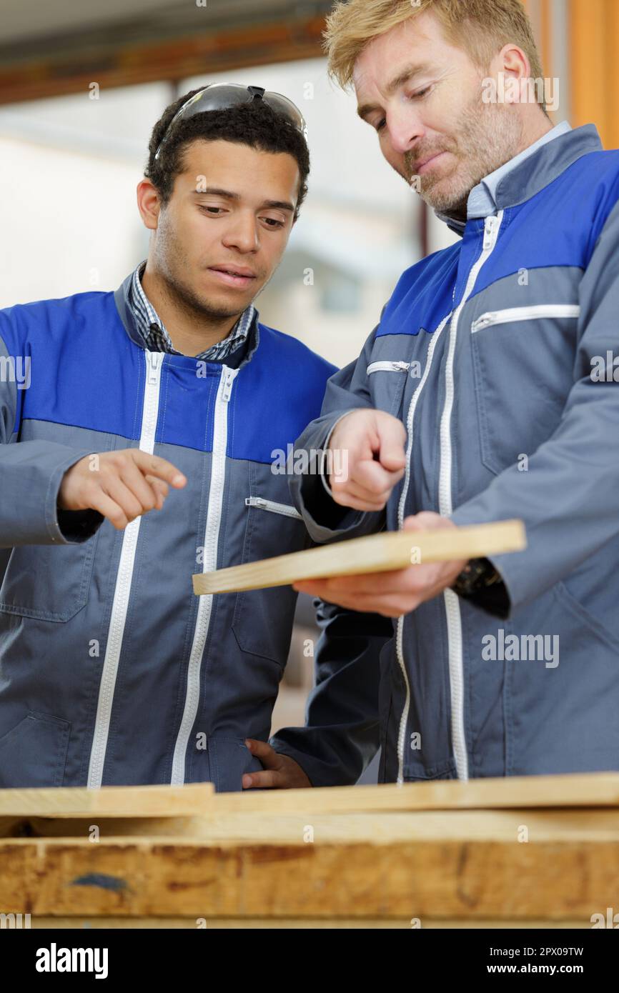 two hardware store co workers Stock Photo - Alamy