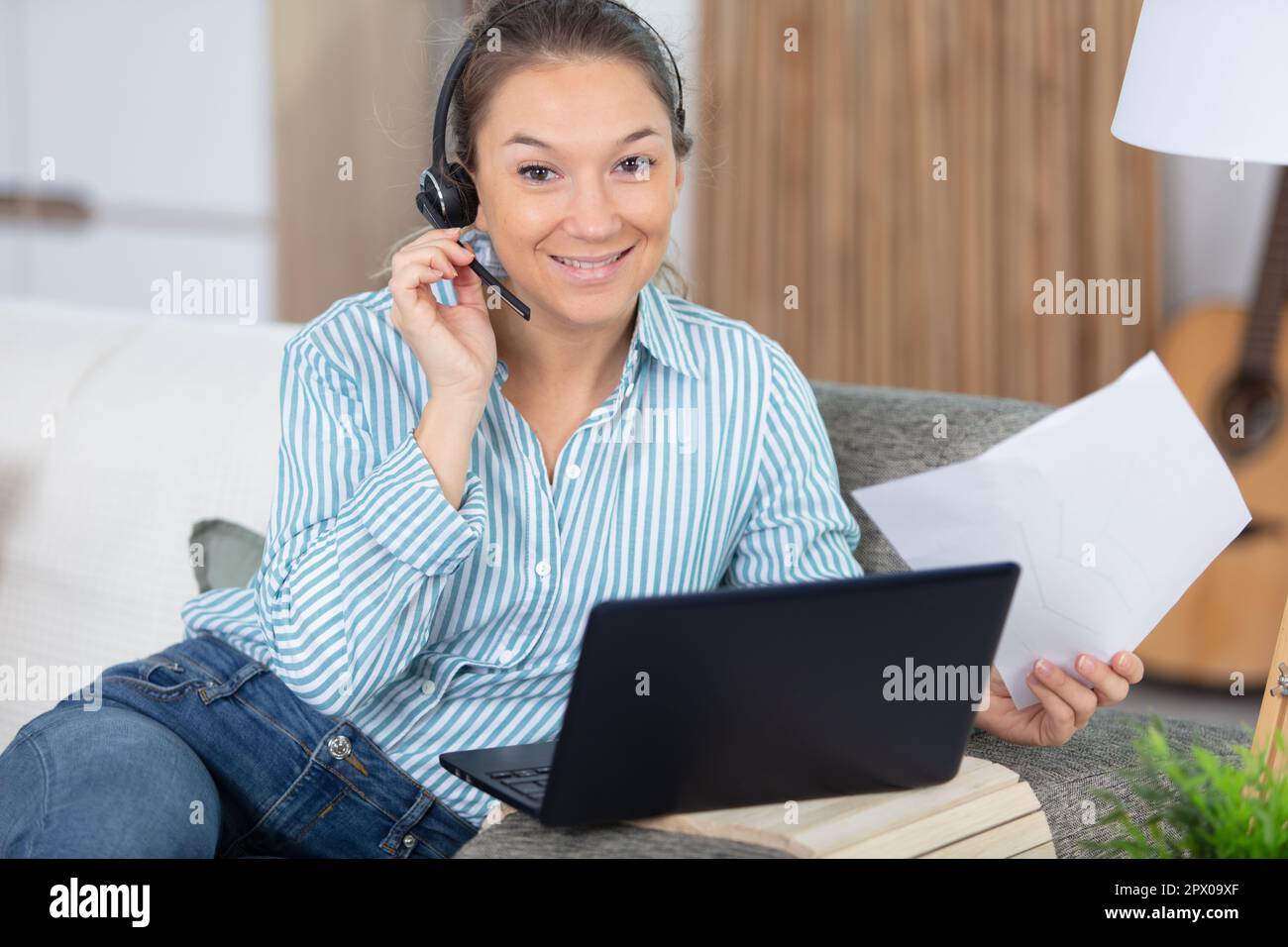 Woman headset and speaking into mic hi-res stock photography and images ...