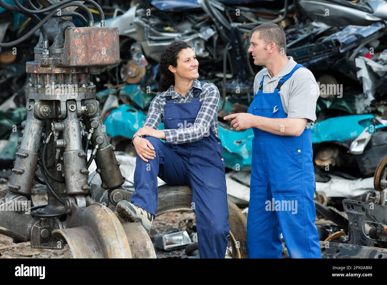 portrait of two mechanics outdoors Stock Photo - Alamy