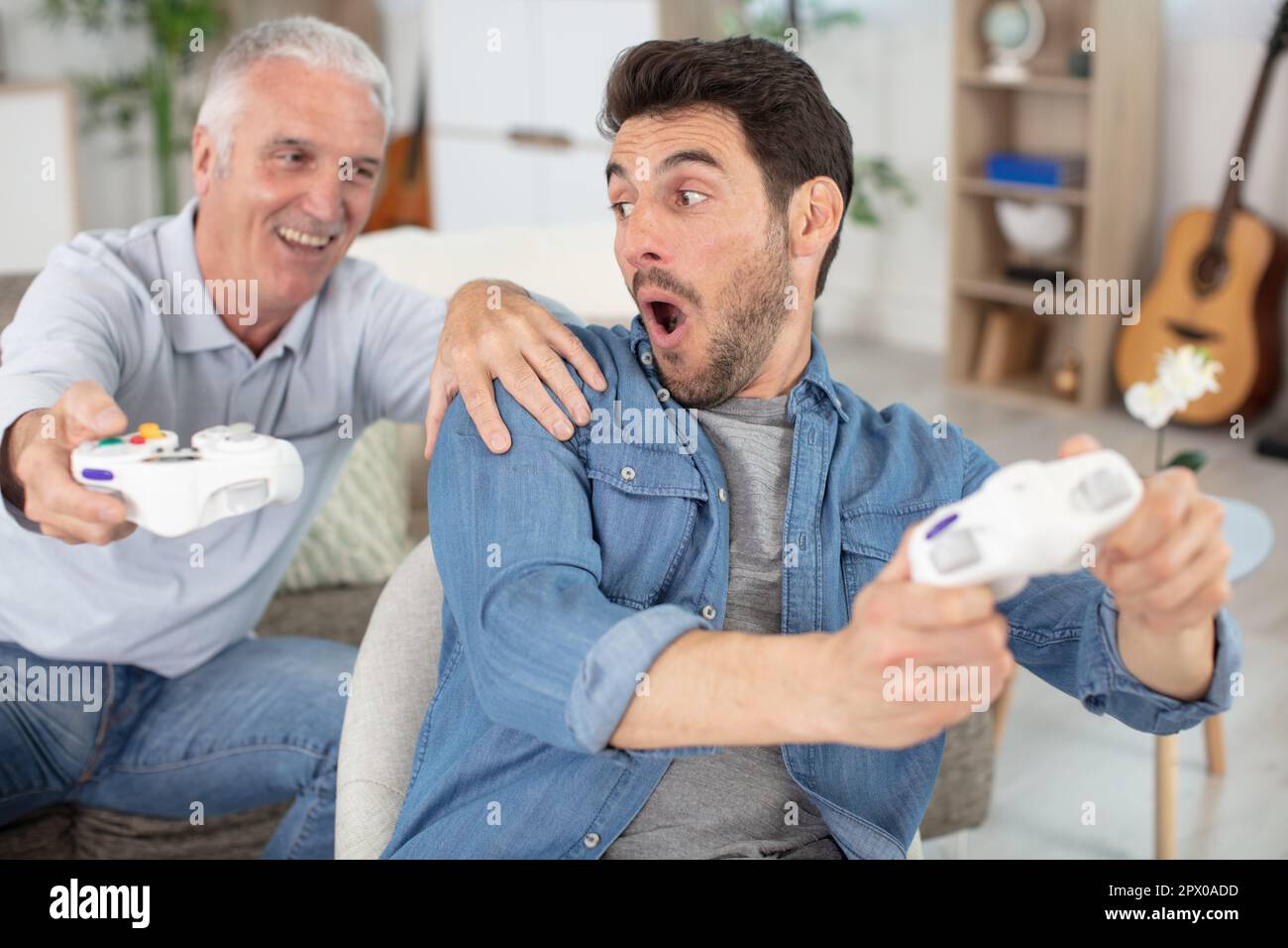animated men playing computer game Stock Photo - Alamy