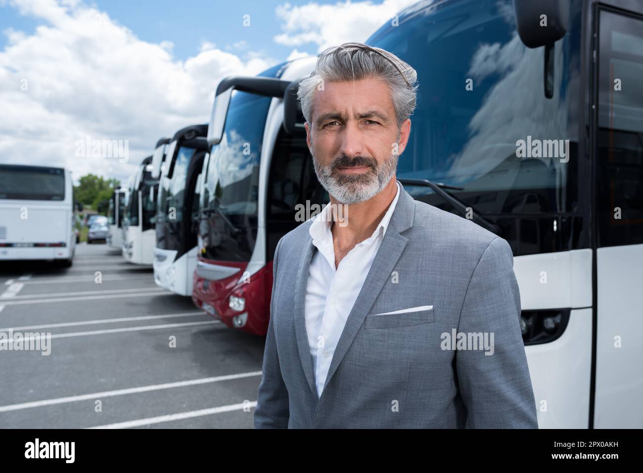 the bus terminal operator posing Stock Photo - Alamy