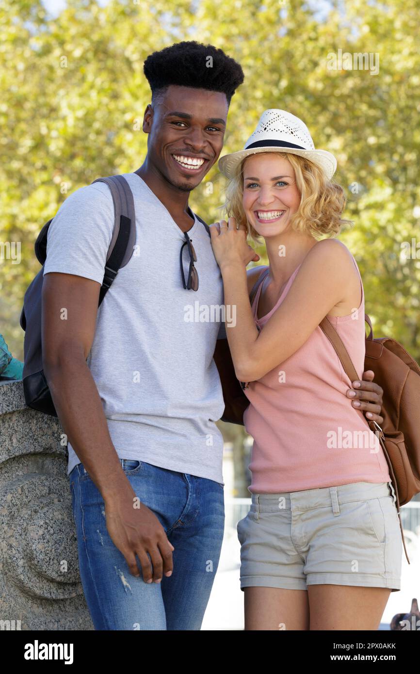 mixed couple laughing and smiling Stock Photo - Alamy