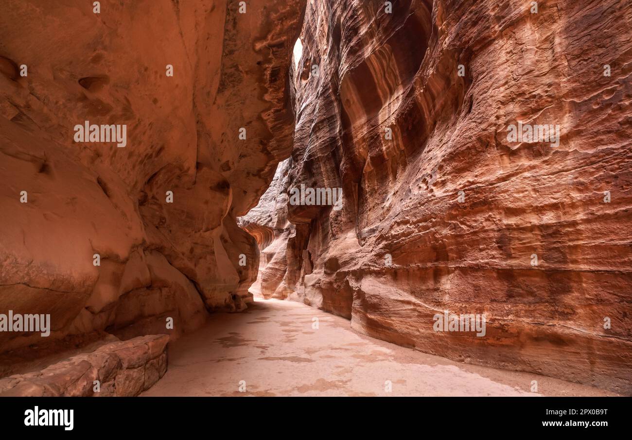 Al Siq Canyon in Petra, Jordan, pink red sandstone walls on both sides ...