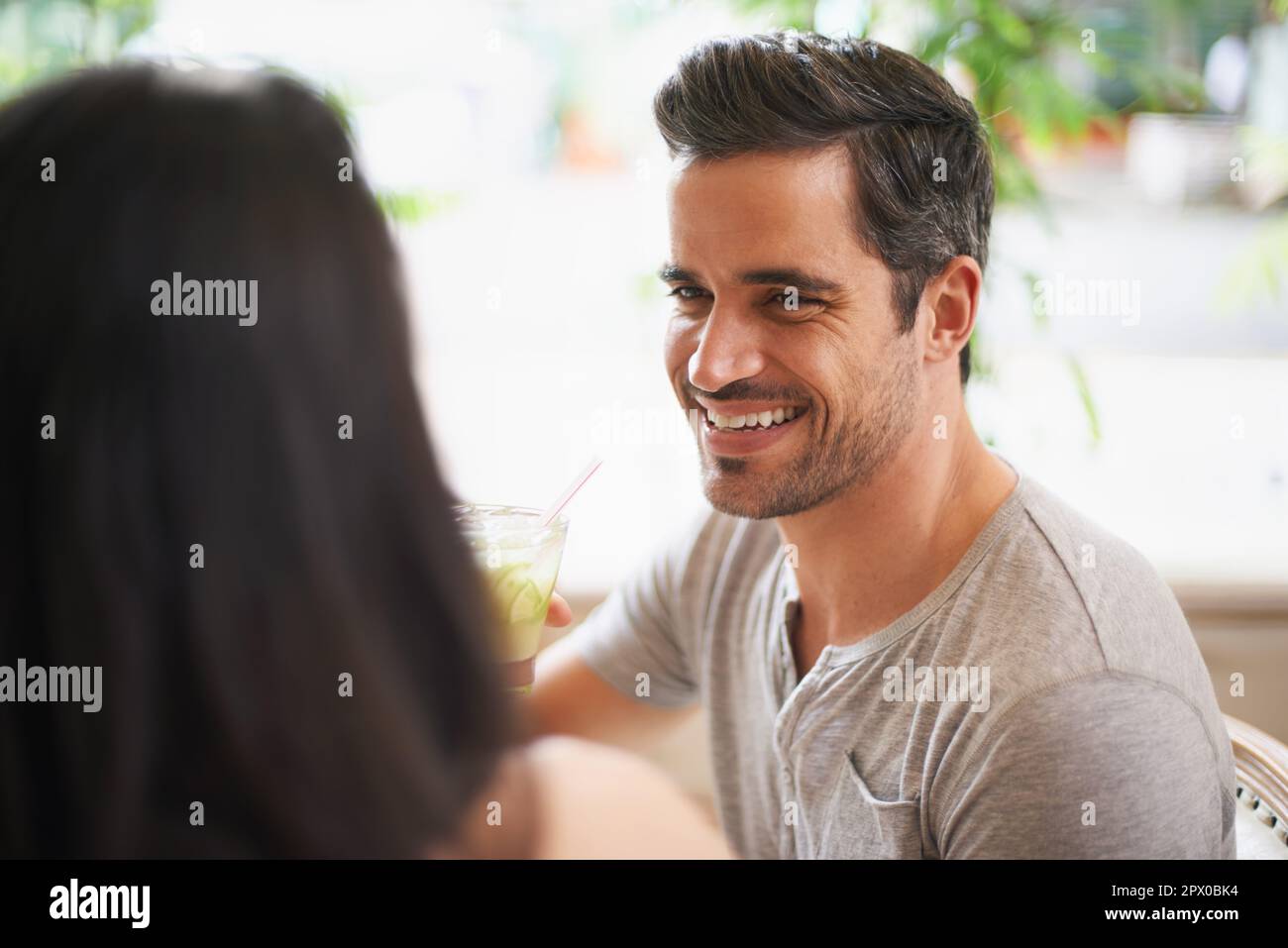 Hes so in love with her. a handsome man on a date with his wife Stock ...