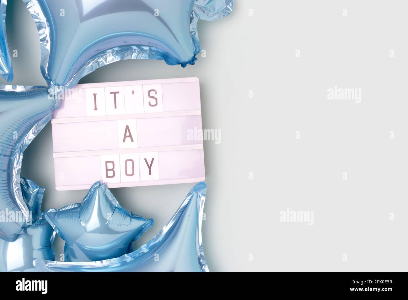 It's a boy. Lightbox with letters and inflatable foil balloons in a ...