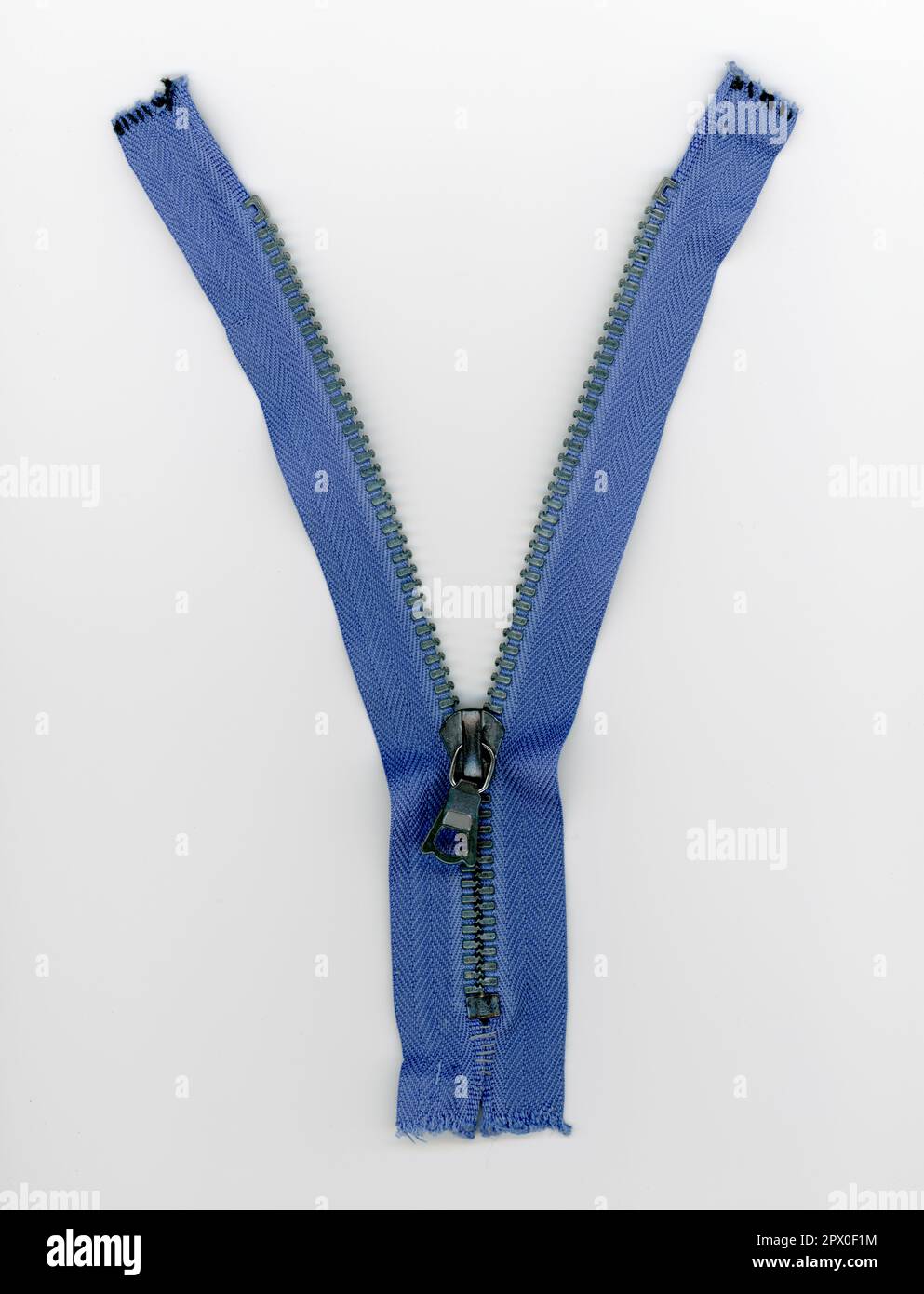 open zip isolated over off white background Stock Photo - Alamy