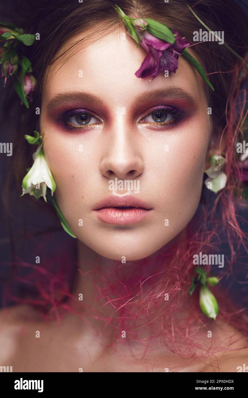Beautiful girl with art make-up and flowers. beauty face. Photos shot ...