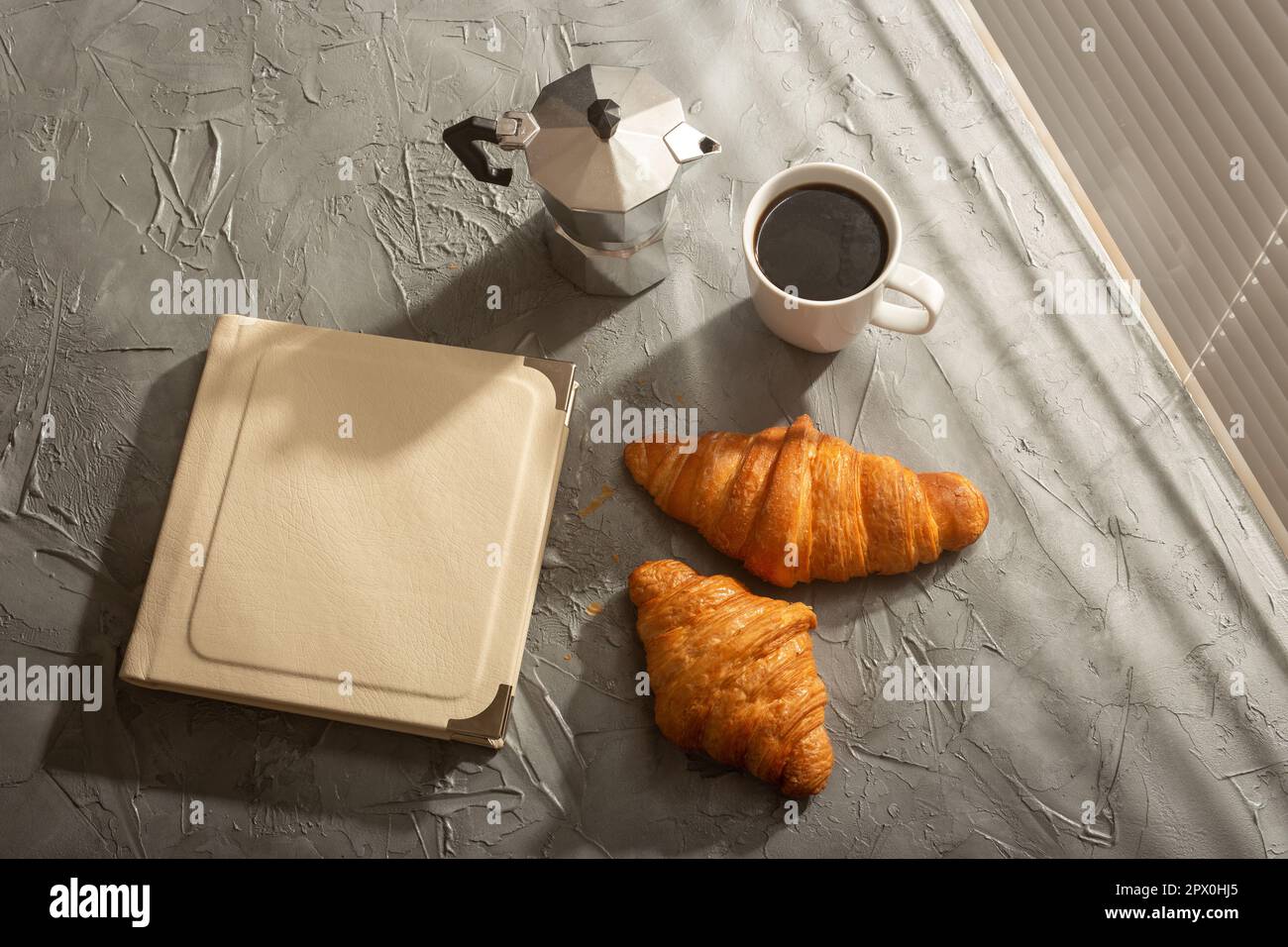 Still life for pleasant morning coffee turk cup and croissants with two ...