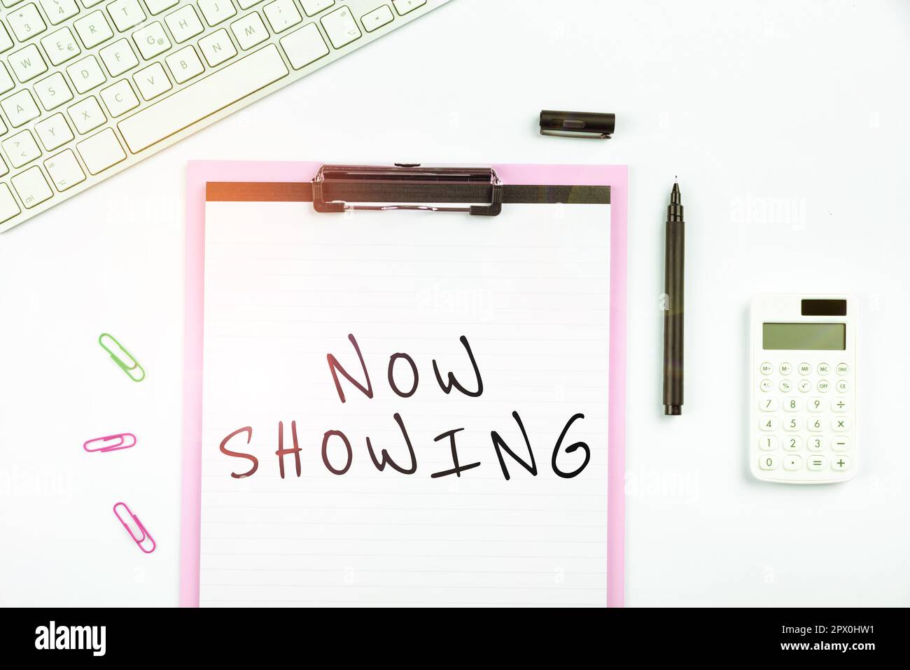 Sign displaying Now Showing, Word for opportunity for the public to see ...