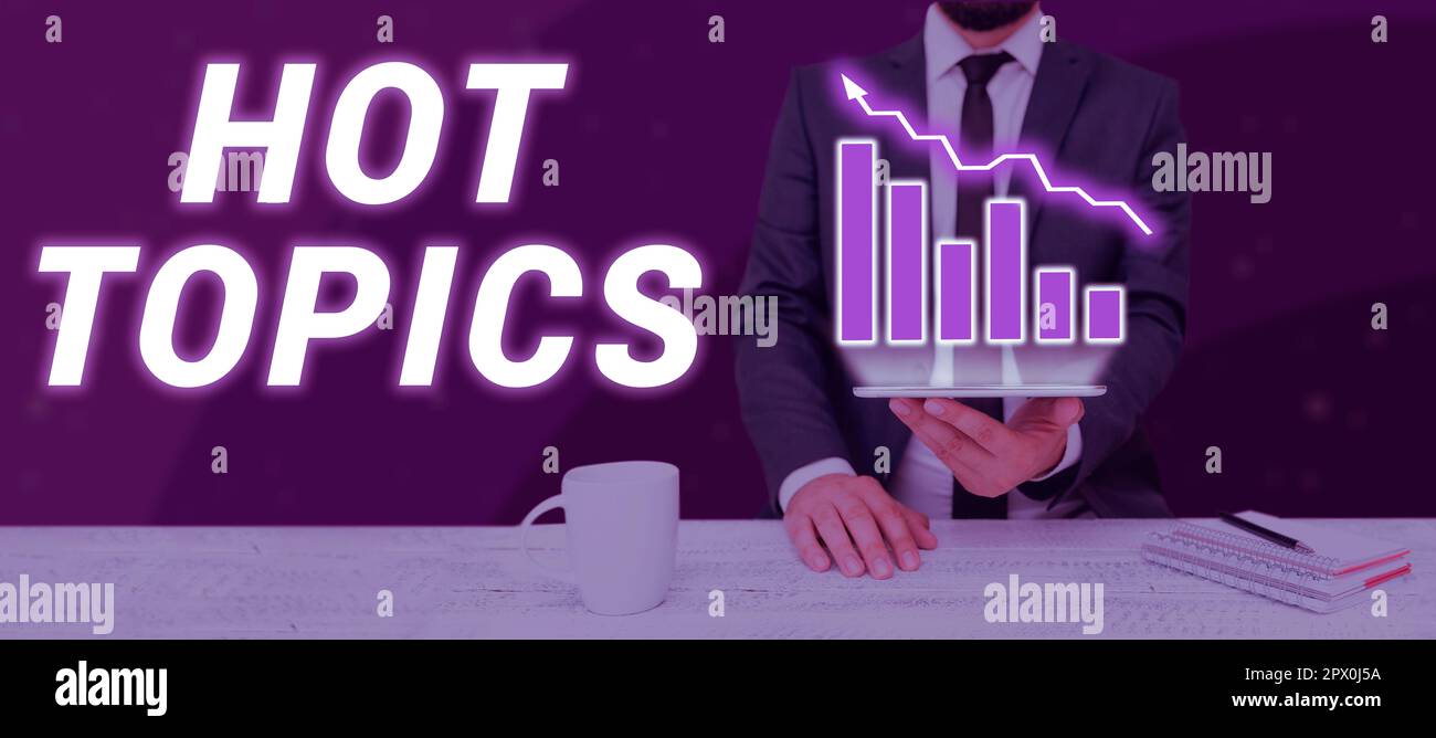 Hand writing sign Hot Topics, Internet Concept subject that a lot of ...