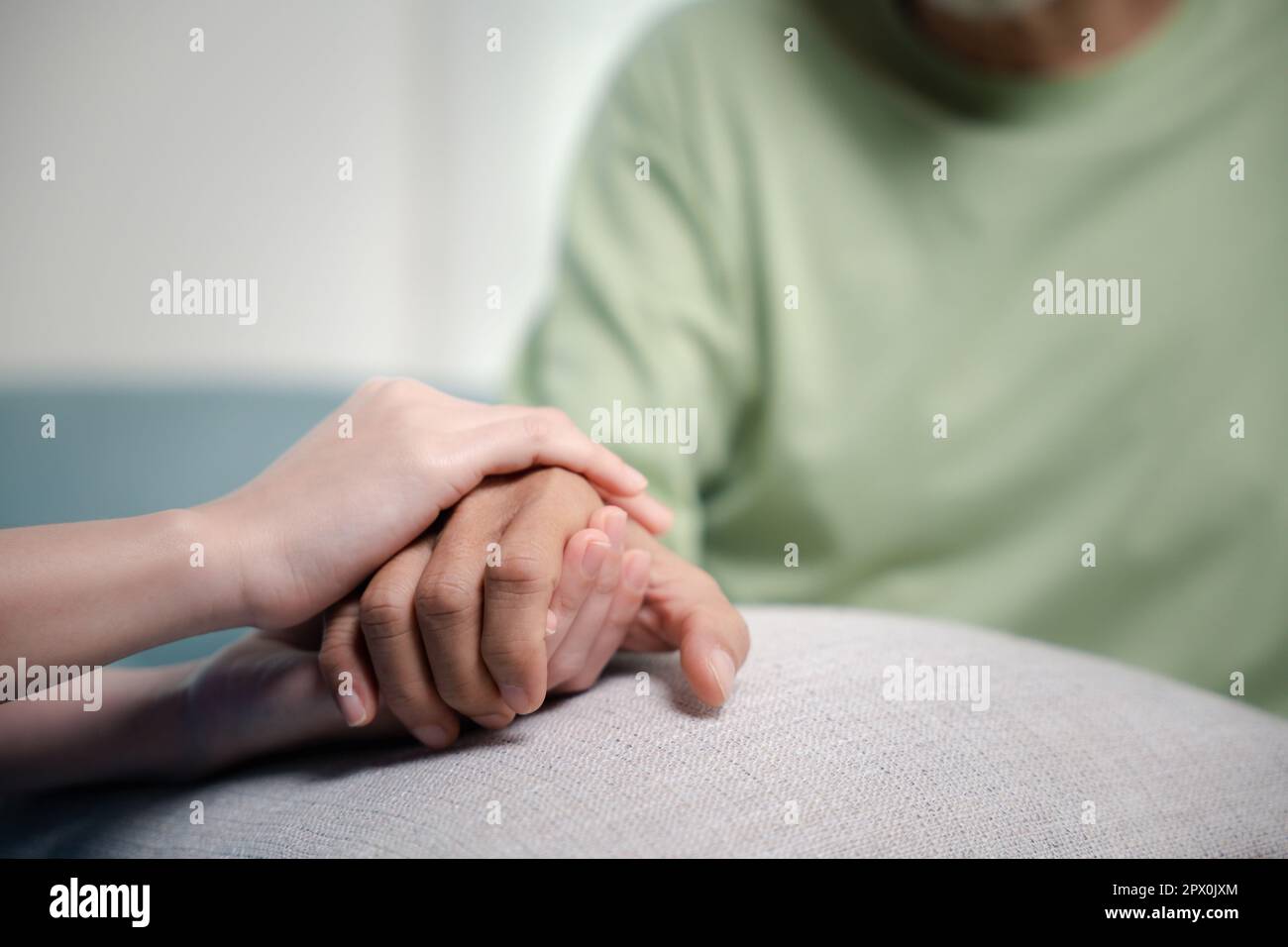International Day for the Elderly. Caring nurse helping elderly old man ...