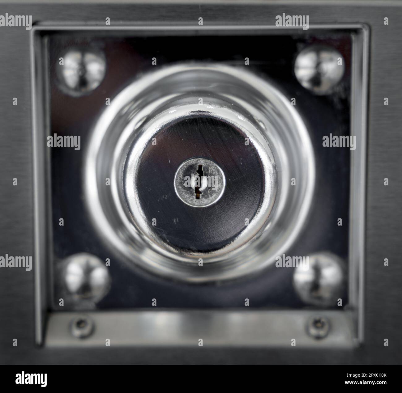 Keyholes. close up detail modern round metal key hole steel door ...