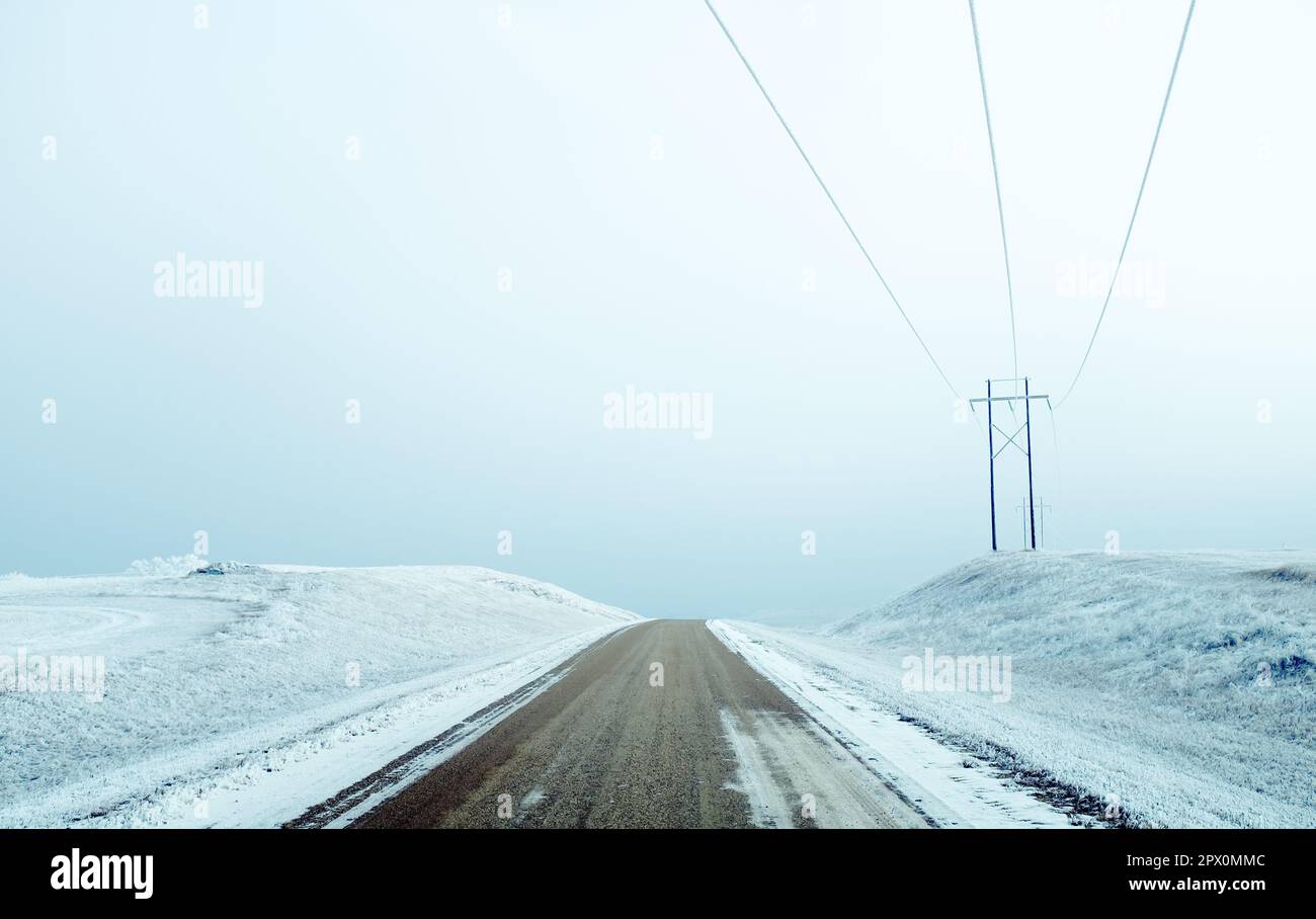 gravel road in rural north dakota leading towards heart river valley in ...