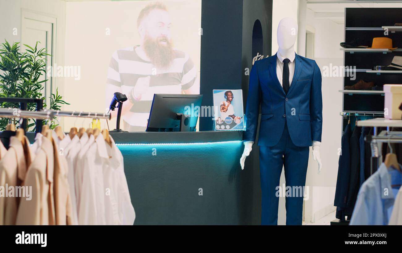 Multiple collections of modern clothes in retail shop boutique, casual ...