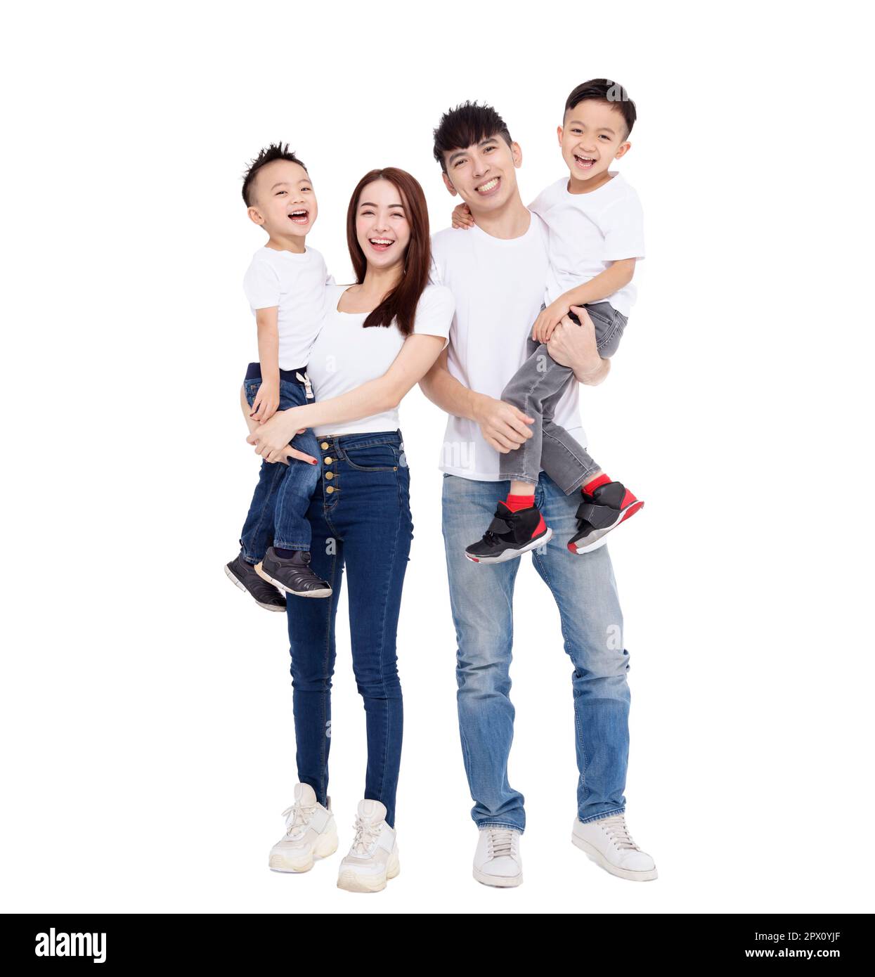 Happy Asian family standing together on white background Stock Photo ...