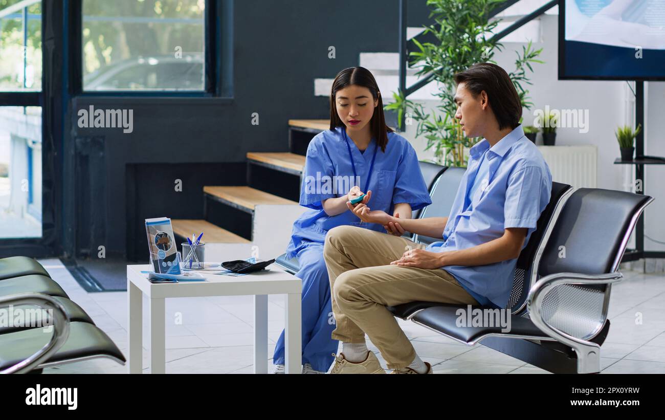 Assistant measuring insulin level and glucose in blood sample using ...