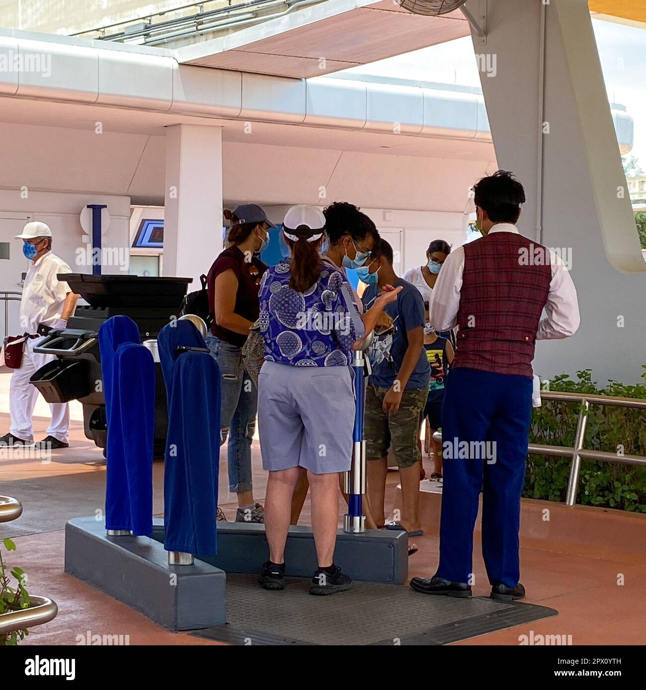Orlando, FL USA- August 3, 2020: People scanning their tickets to get ...