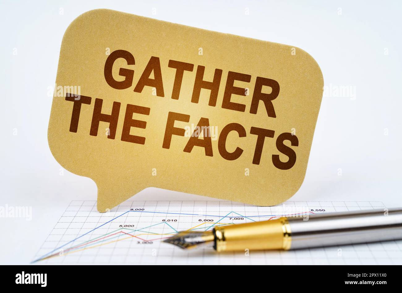 Business concept. On the business diagram is a pen and a sign with the ...