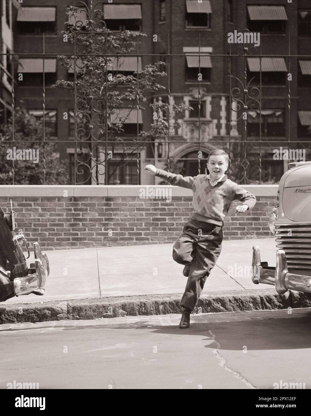Teen boy running suburban hi-res stock photography and images - Alamy